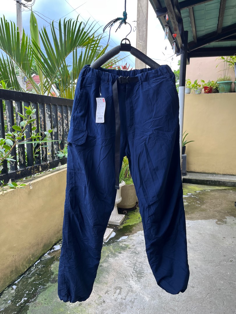 Uniqlo Blue Parachute Pants, Men's Fashion, Bottoms, Joggers on Carousell