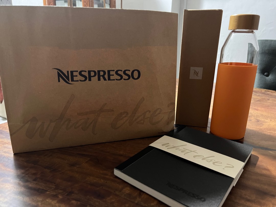Nespresso glass bottle with silicon cover, notebook and paper bag ...