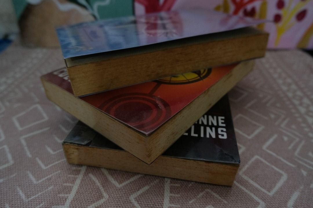 The Hunger Games Trilogy by Suzanne Collins, Hobbies & Toys, Books ...