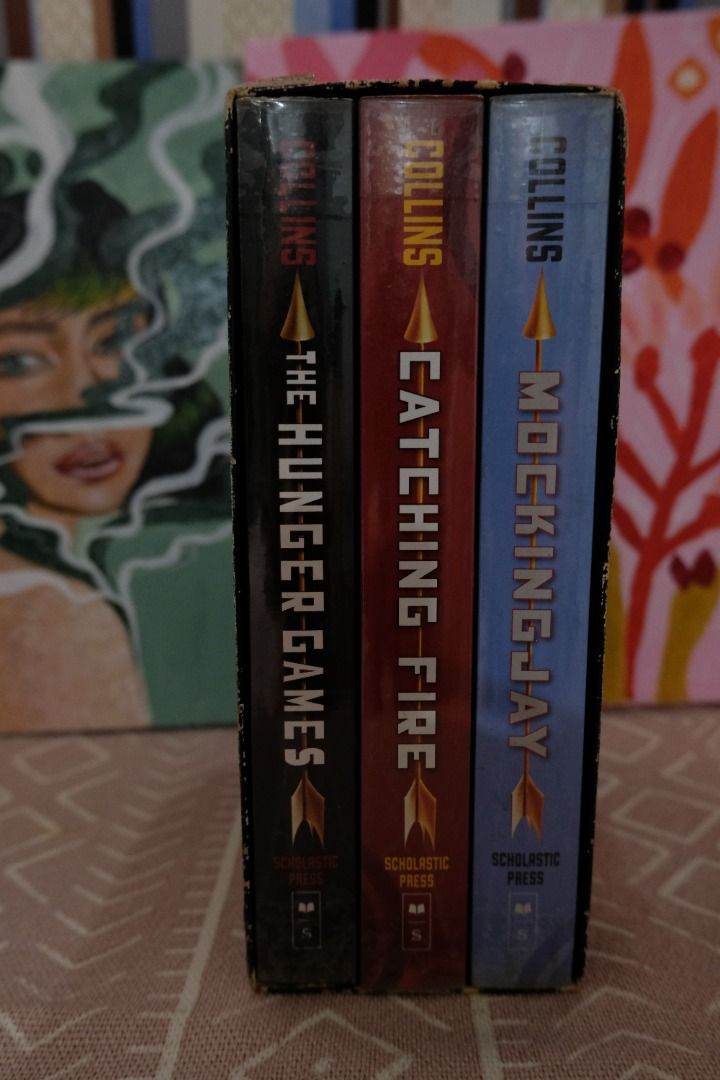 The Hunger Games Trilogy by Suzanne Collins, Hobbies & Toys, Books ...
