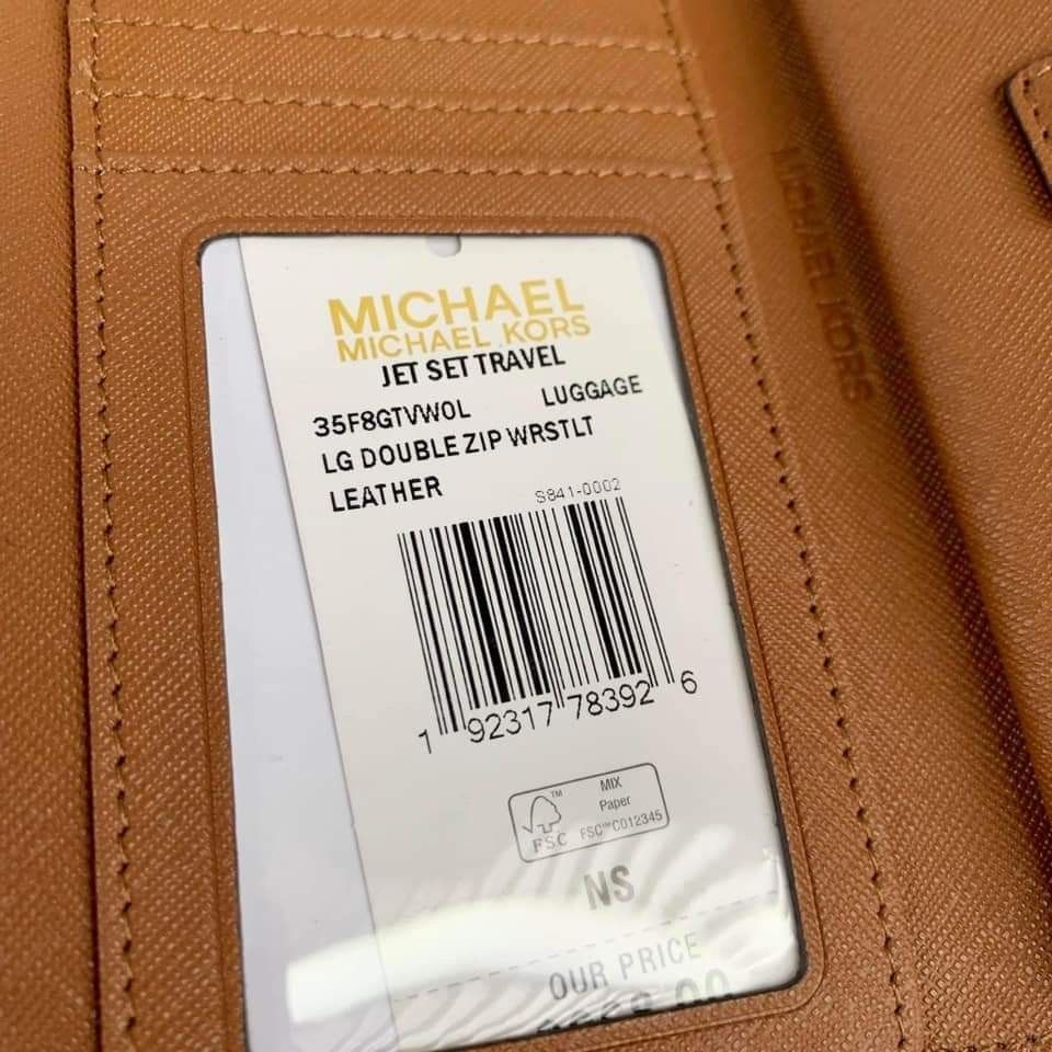 MK Jet Set Travel Logo Double Zip Wrislet in Tan on Carousell