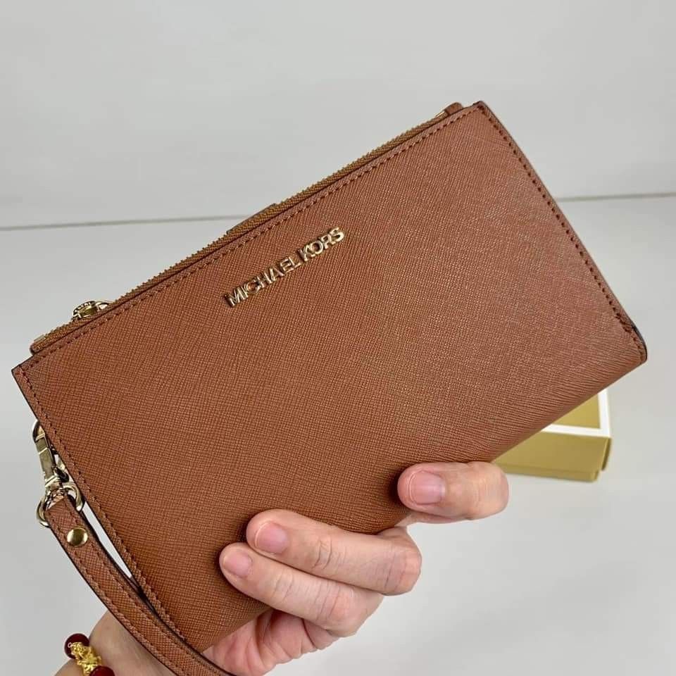 MK Jet Set Travel Logo Double Zip Wrislet in Tan on Carousell