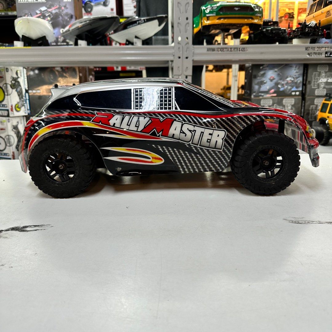 [PRE-OWNED] 1/8 REMO HOBBY RALLY MASTER 2-3S BRUSHLESS RTR RC CAR ...