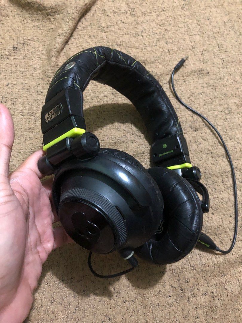 Vintage rare skullcandy T.I. Neon and black headphones on Carousell