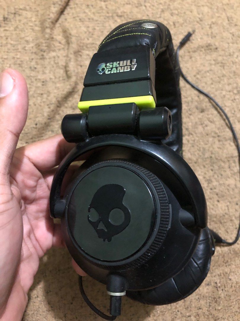 Vintage rare skullcandy T.I. Neon and black headphones on Carousell