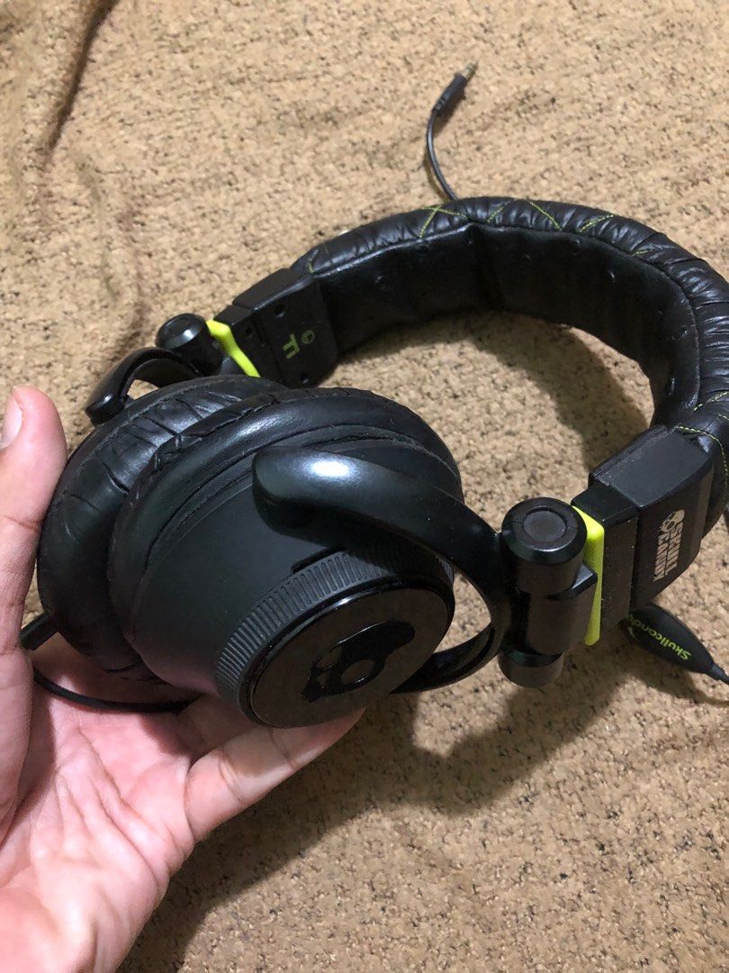 Vintage rare skullcandy T.I. Neon and black headphones on Carousell