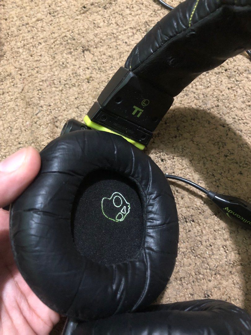 Vintage rare skullcandy T.I. Neon and black headphones on Carousell