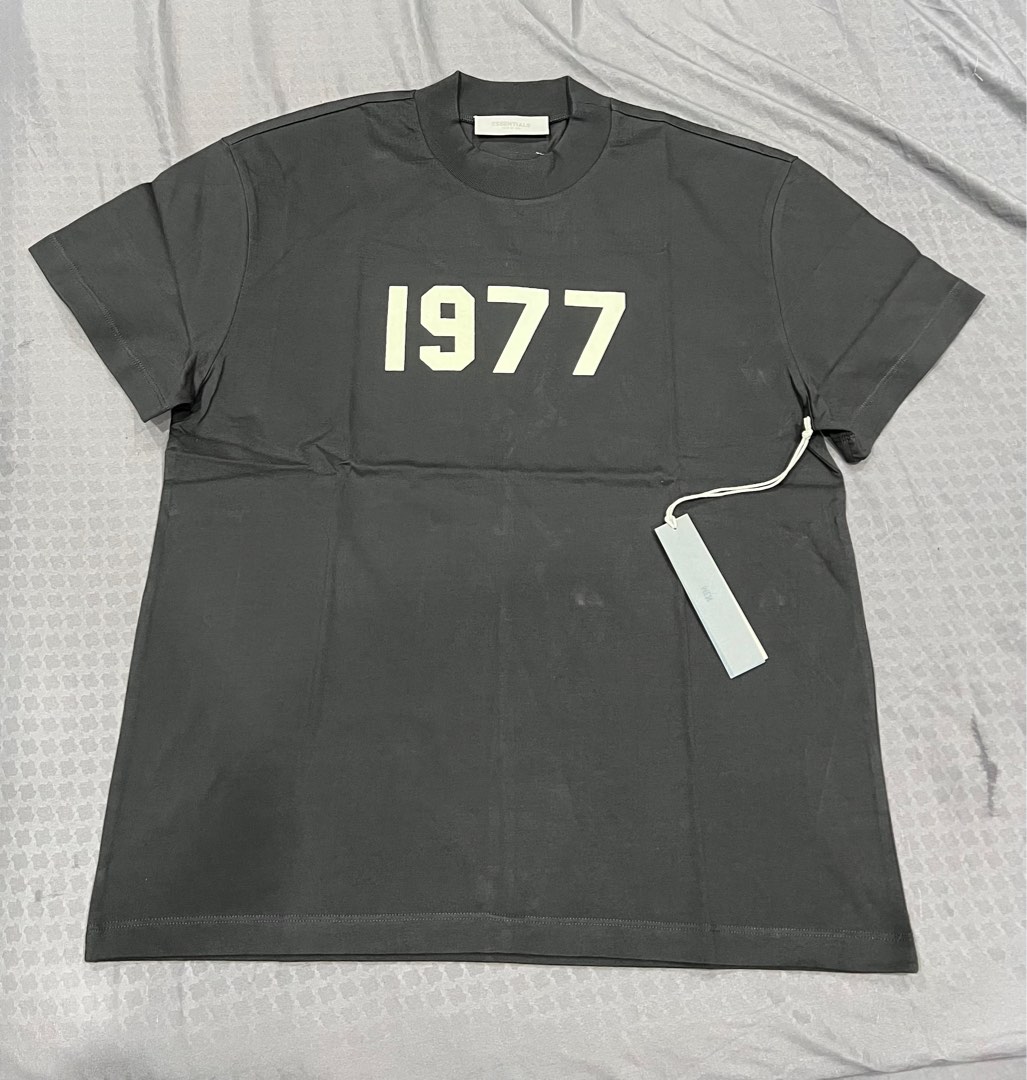 Essentials 1977 iron tee, Men's Fashion, Tops & Sets, Tshirts & Polo ...