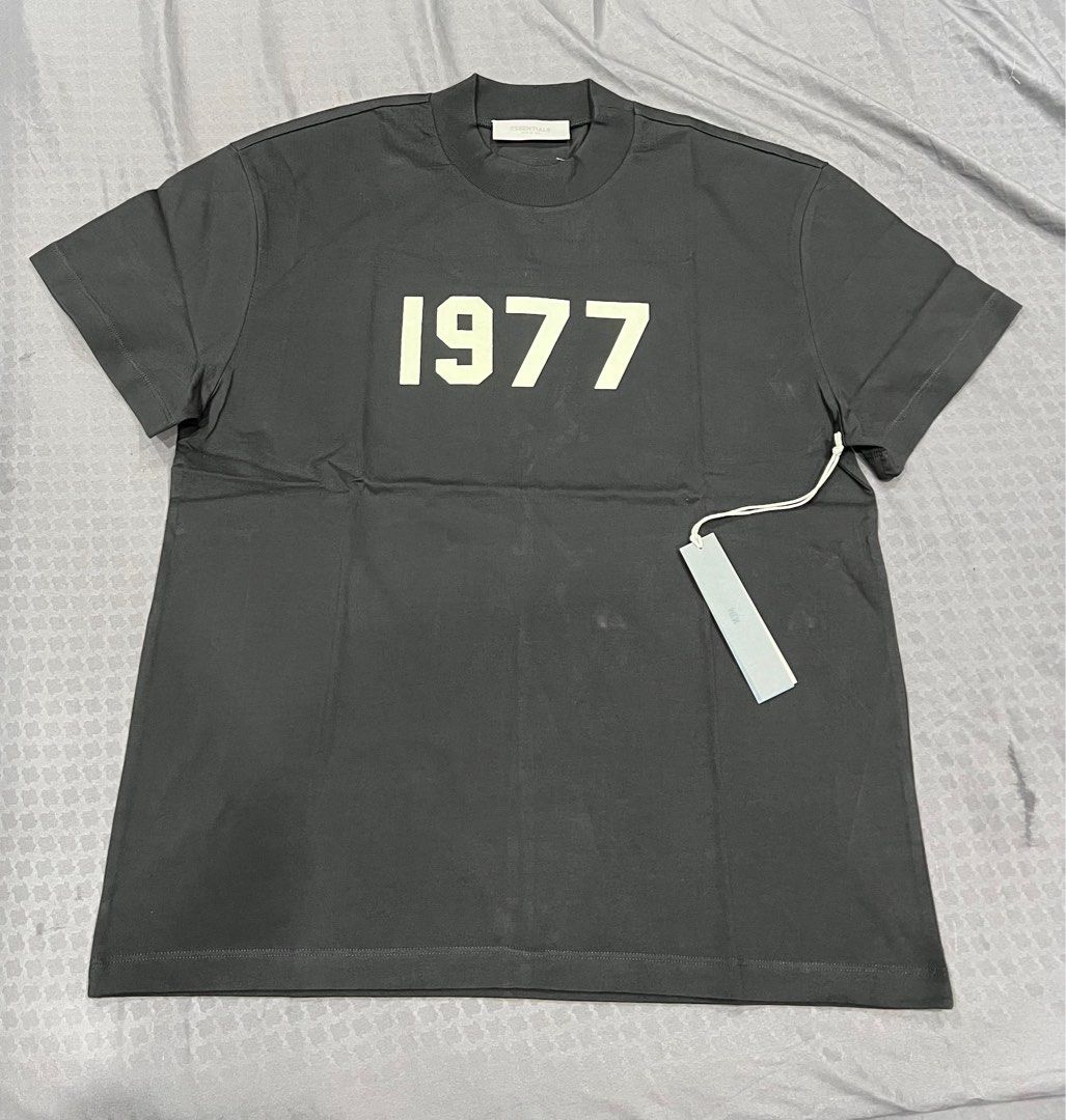 Essentials 1977 iron tee, Men's Fashion, Tops & Sets, Tshirts & Polo ...
