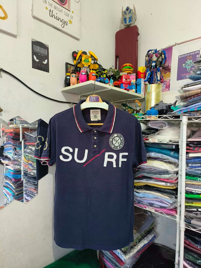 Kaos Polo Nylaus Clothing Biru Dongker Surf Big Logo, Fesyen Pria, Pakaian , Atasan di Carousell