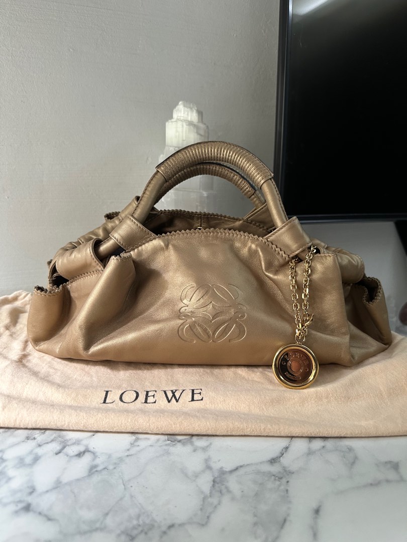 Loewe metallic gold nappa leather aire bag, Women's Fashion, Bags ...