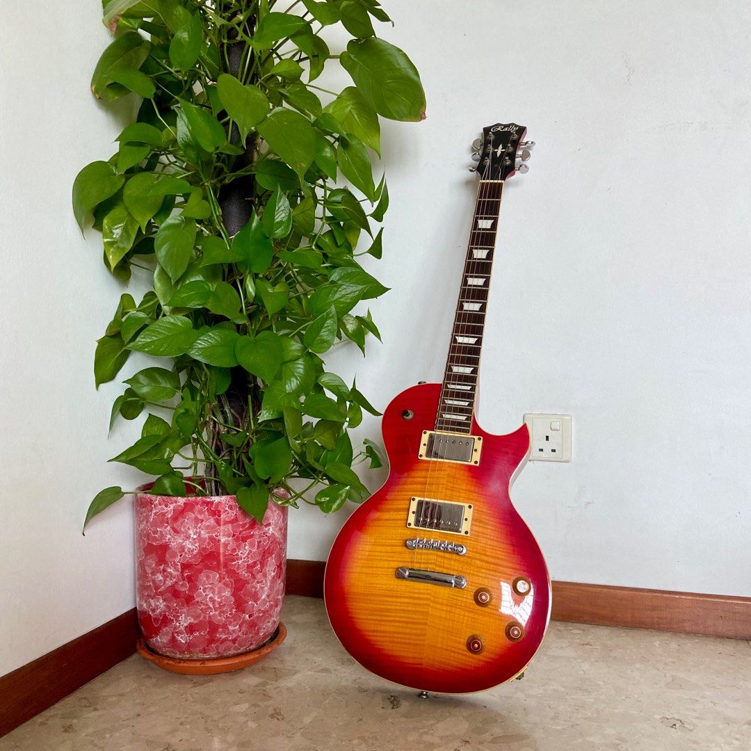 Rally Les Paul electric guitar in vintage cherry sunburst color w ...