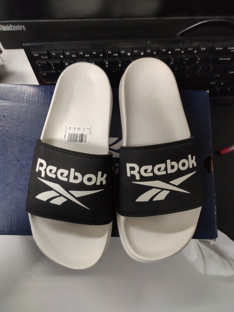 Reebok slides, Men's Fashion, Footwear, Slippers & Slides on Carousell
