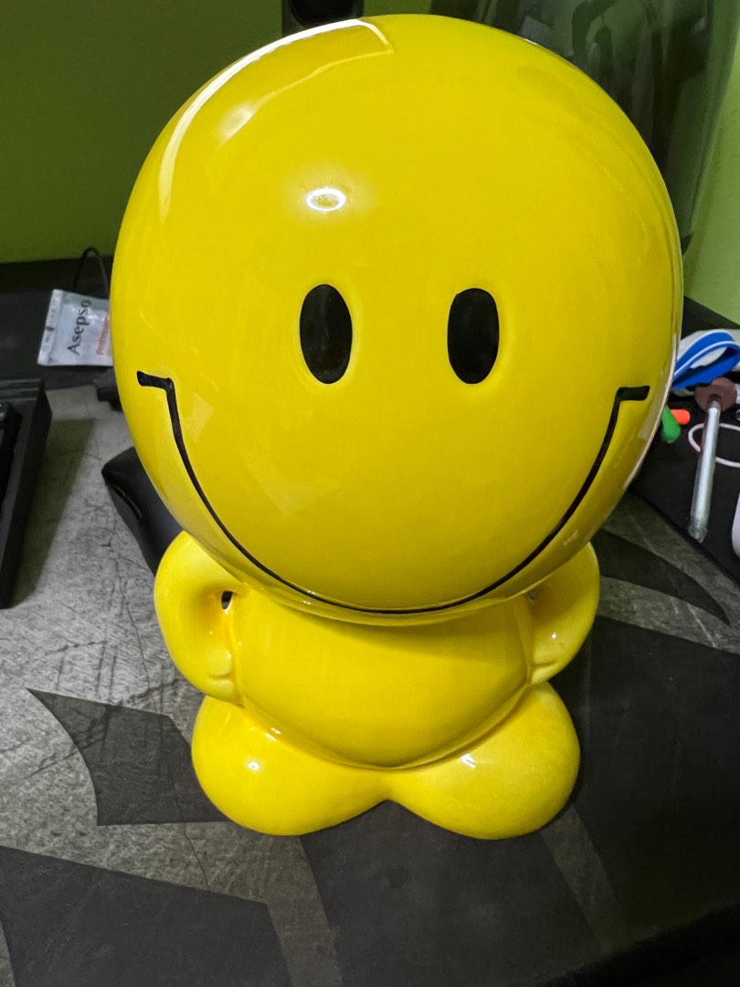 Smiley guy piggy bank, Hobbies & Toys, Toys & Games on Carousell