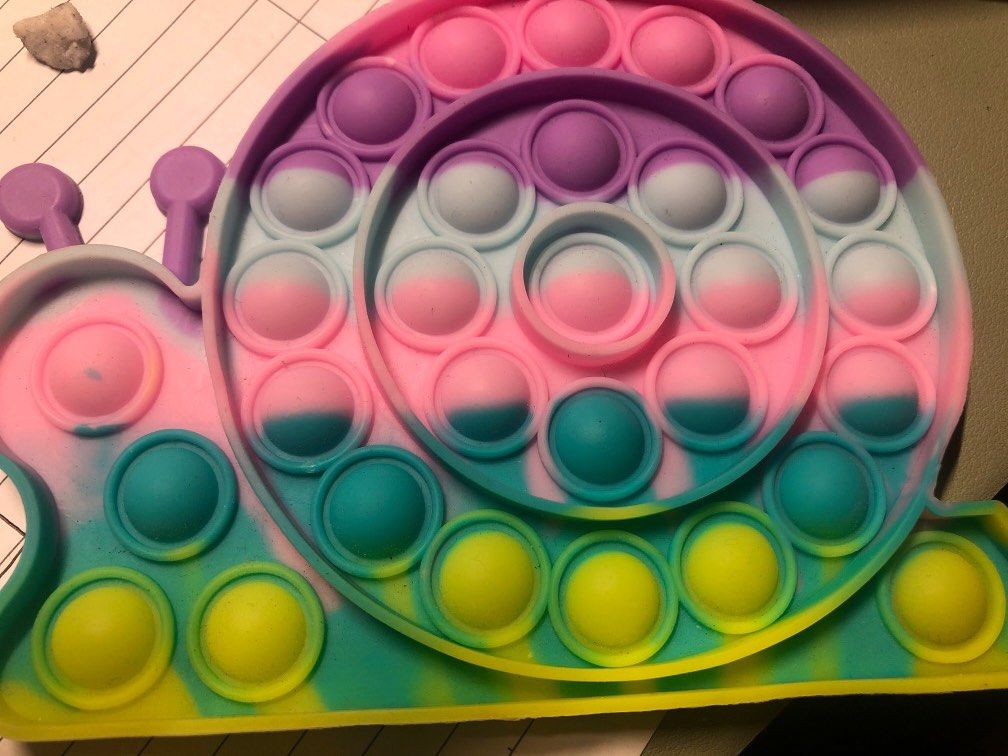 Snail pop it, Hobbies & Toys, Toys & Games on Carousell