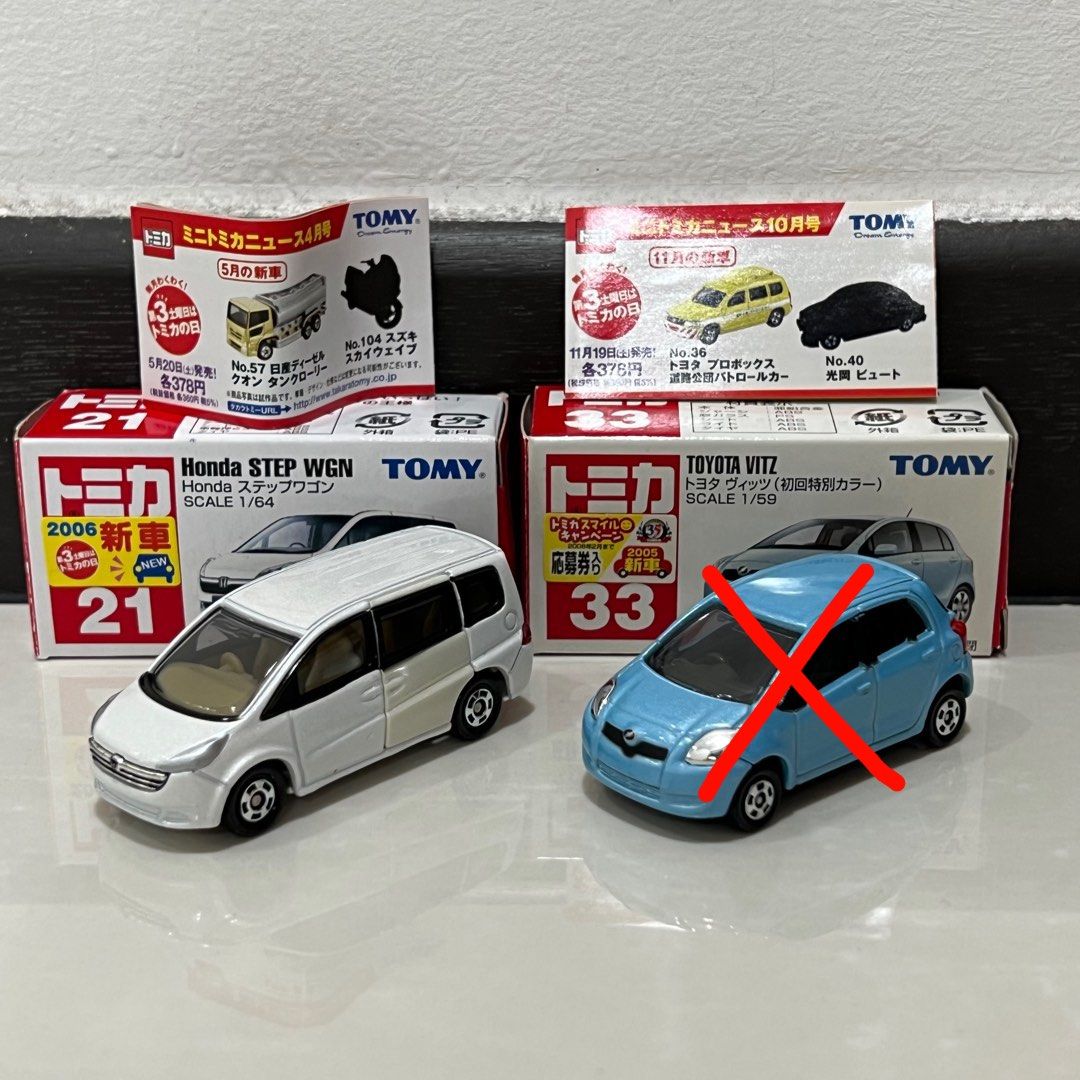 Tomica #21 Honda Step Wgn, #33 Toyota Vitz with new car sticker ...