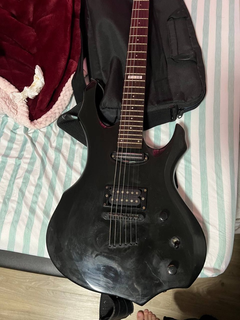 ESP F-10 (electric guitar), and an acoustic guitar with a rack, Hobbies ...