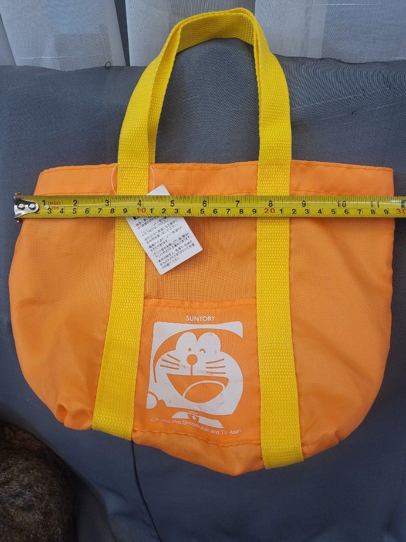 Suntory Doraemon Orange Tote Bag, Women's Fashion, Bags & Wallets, Tote Bags on Carousell
