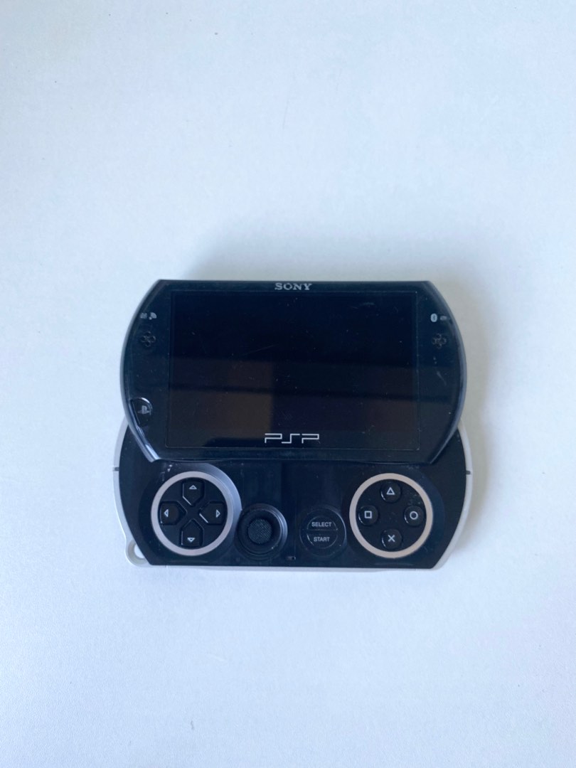 PSP go + orig charger ~ defective unit, Video Gaming, Video Game ...