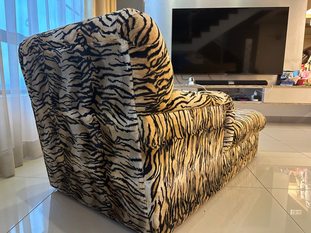 Beautiful lazy Tiger sofa, Furniture & Home Living, Furniture, Sofas on Carousell