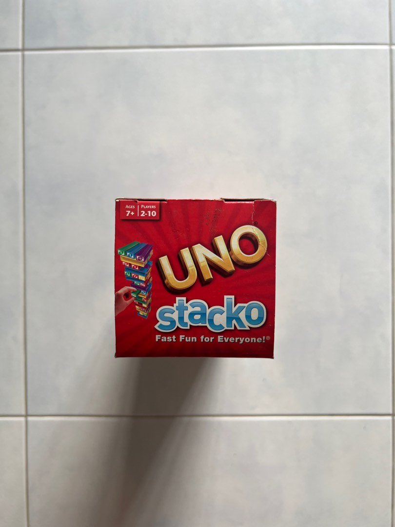 UNO Stacko (Board game), Hobbies & Toys, Toys & Games on Carousell