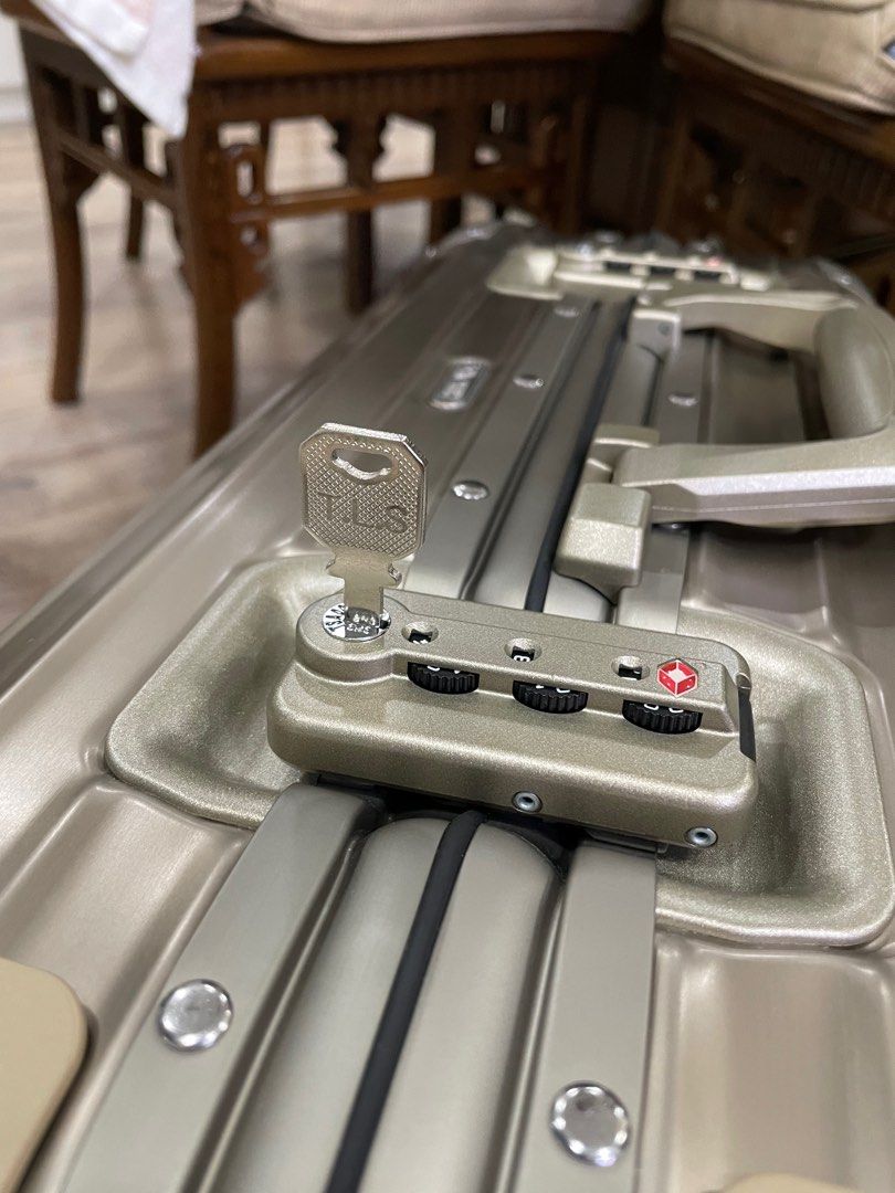 Rimowa Key lock opening, Hobbies & Toys, Travel, Luggage on Carousell