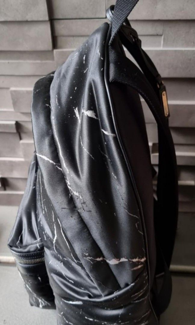 Saint Laurent (YSL) City Backpack, Luxury, Bags & Wallets on Carousell