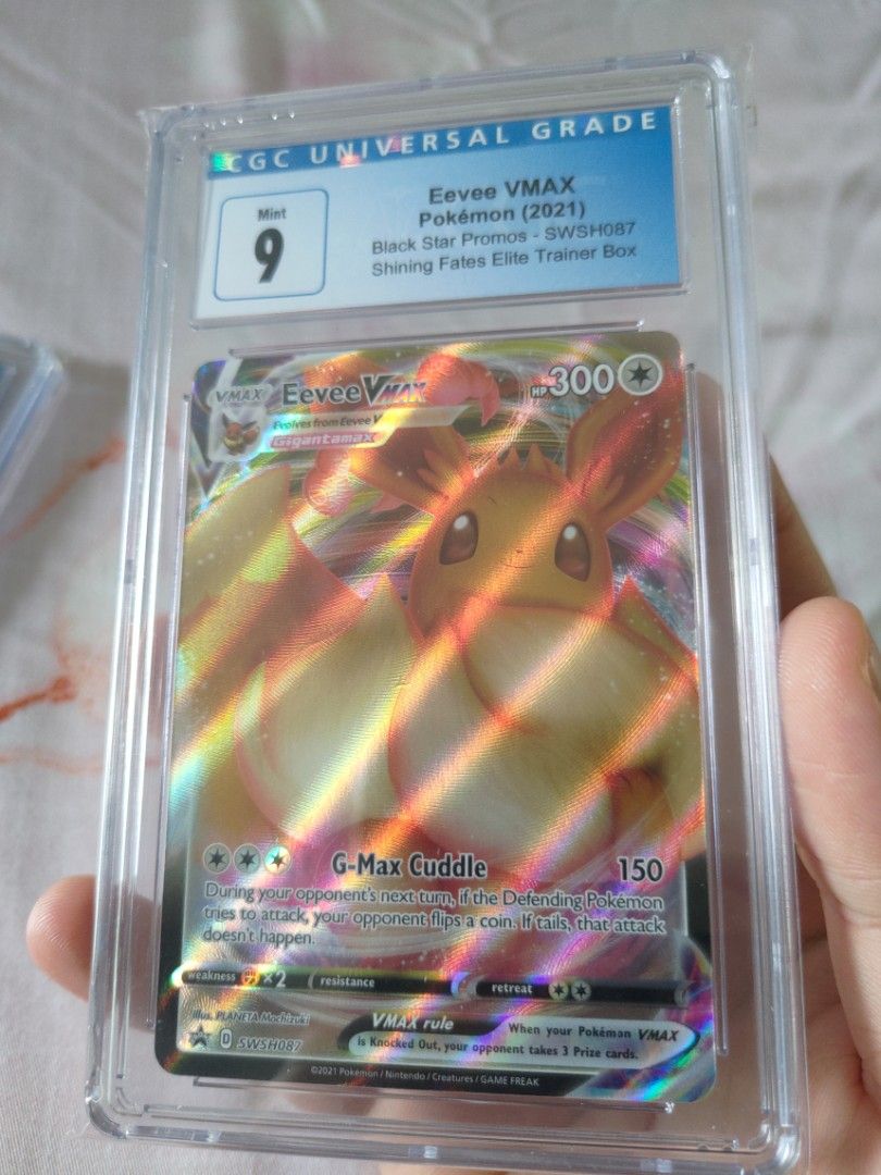 Pokemon CGC Universal Grade Cards Gem Mint/Mint Charizard and Eevee ...