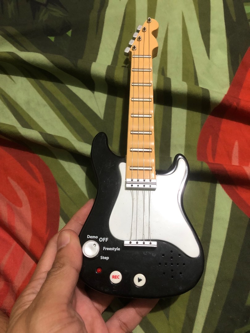 Small electric guitar sound toy, Hobbies & Toys, Toys & Games on Carousell