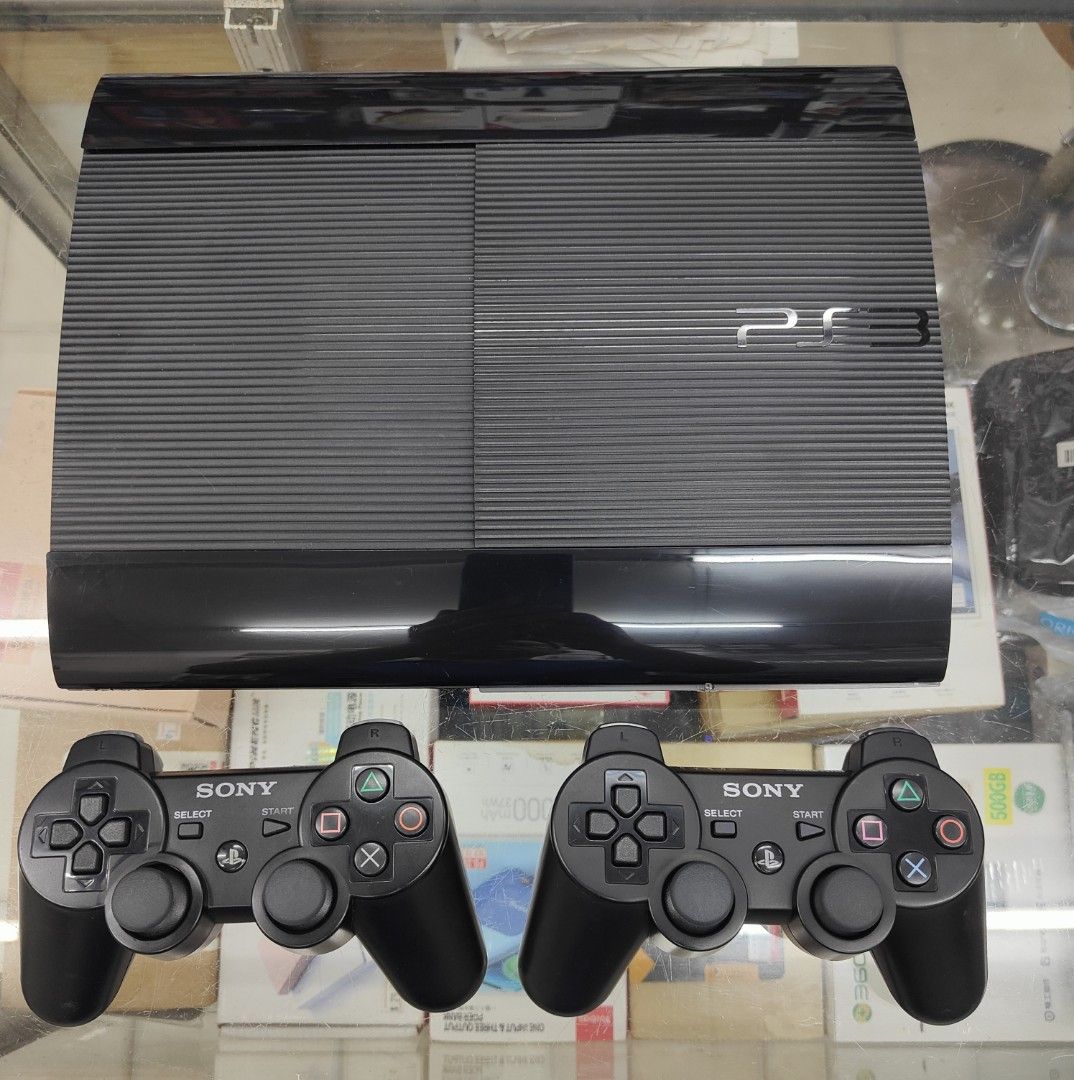 Sony PS3 Super Slim 500GB Console + 2 Original Wireless Controllers ...