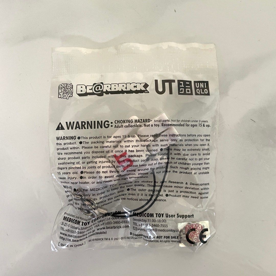 Brand new bearbrick uniqlo white UT 70% keychain, Hobbies & Toys, Toys ...