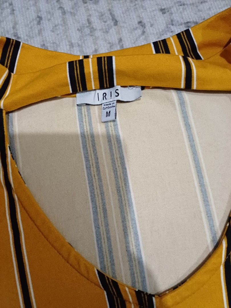 Yellow body hugging blouse, Women's Fashion, Tops, Blouses on Carousell