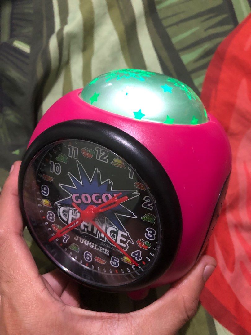 Cute gogo chance juggler lights and sound desk clock, Furniture & Home ...