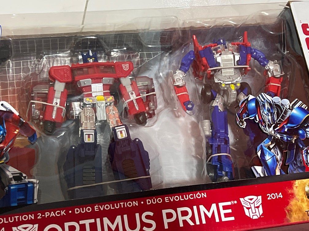 MISB Toyrus exclusive Set Optimus prime & Grimlock hasbro evolution 2 ...
