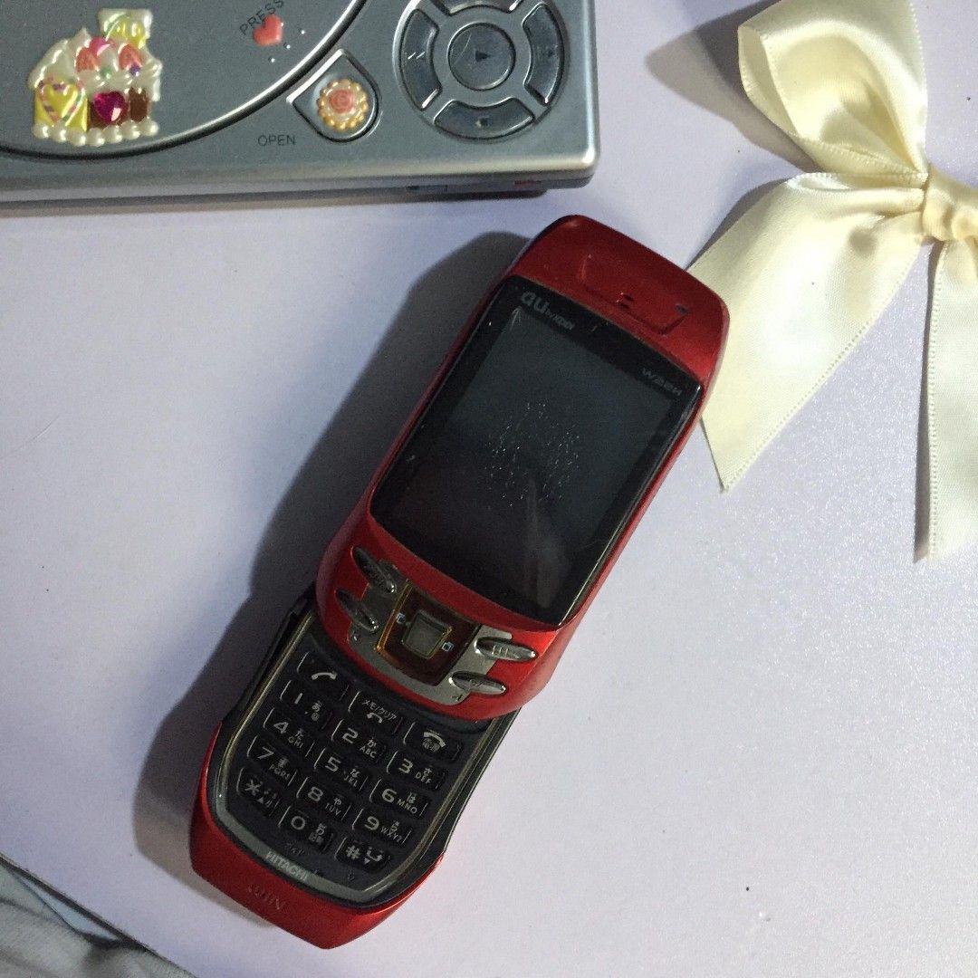 Y2k sliding phone, Everything Else, Others on Carousell