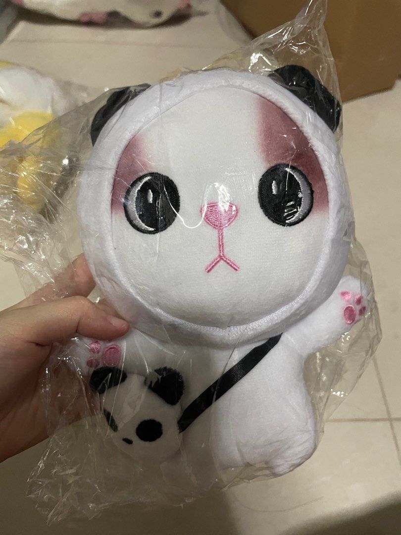 Cat in panda costume plush, Hobbies & Toys, Toys & Games on Carousell