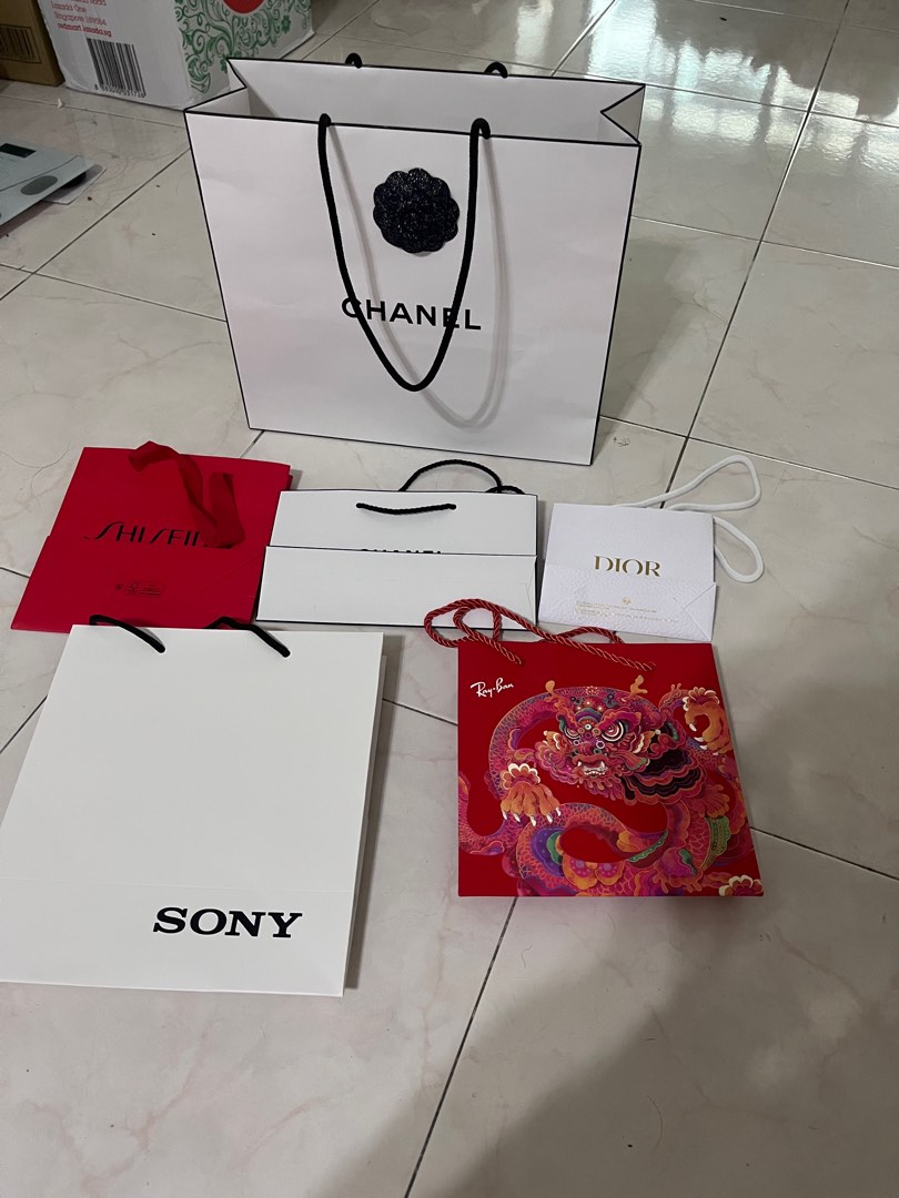 Chanel paper bag, Women's Fashion, Bags & Wallets, Tote Bags on Carousell