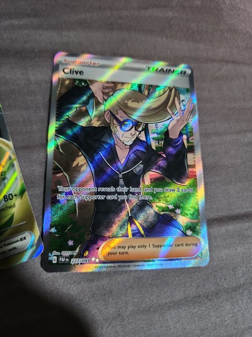 Clive Trainer Pokemon Scarlet Violet Paldean Fates, Hobbies & Toys ...