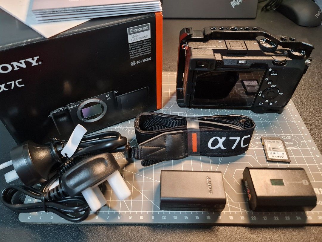Sony a7c body + Smallrig cage + 3M skin, Photography, Cameras on Carousell
