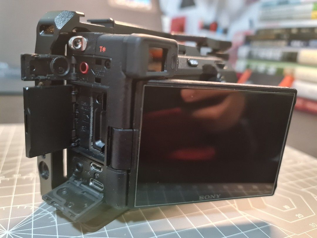 Sony a7c body + Smallrig cage + 3M skin, Photography, Cameras on Carousell