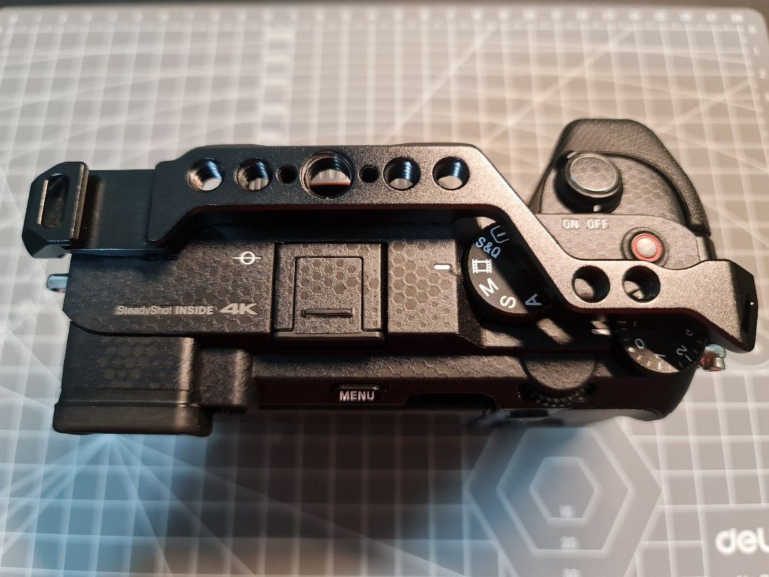 Sony a7c body + Smallrig cage + 3M skin, Photography, Cameras on Carousell