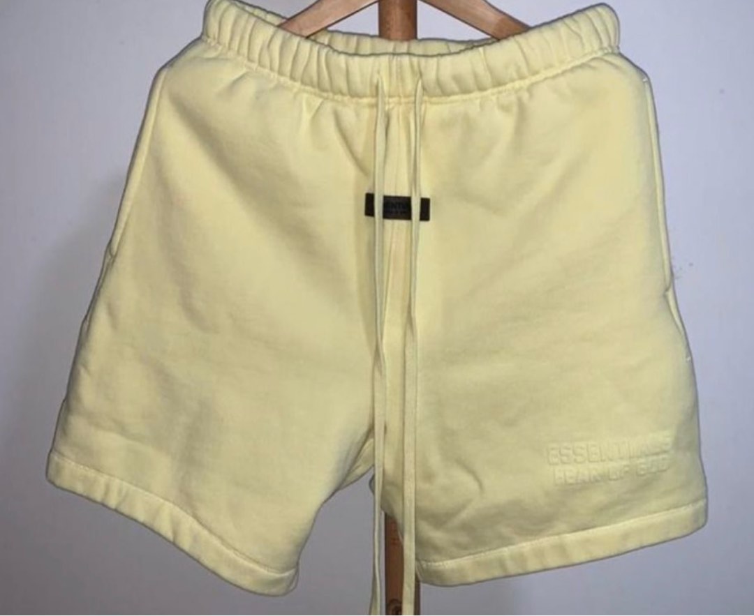 FEAR OF GOD ESSENTIALS YELLOW SHORTS, Men's Fashion, Bottoms, Shorts on ...