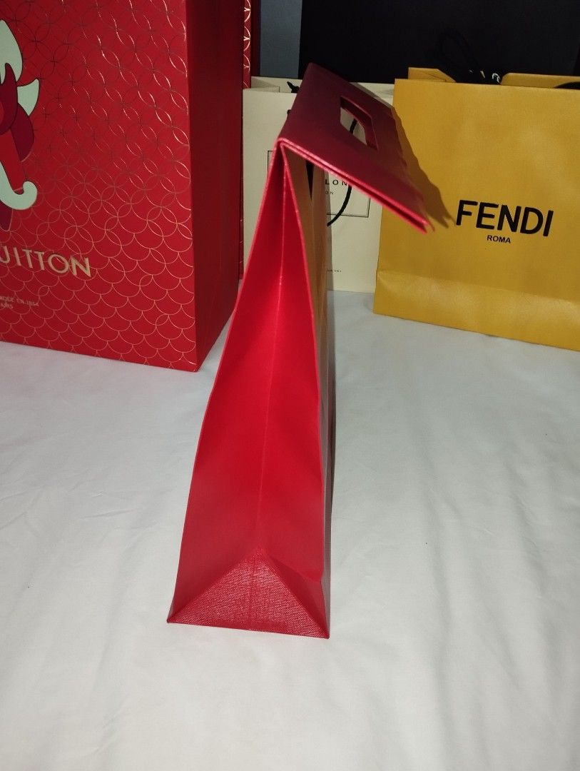YSL red paper bag (CNY 2024), Luxury, Accessories on Carousell