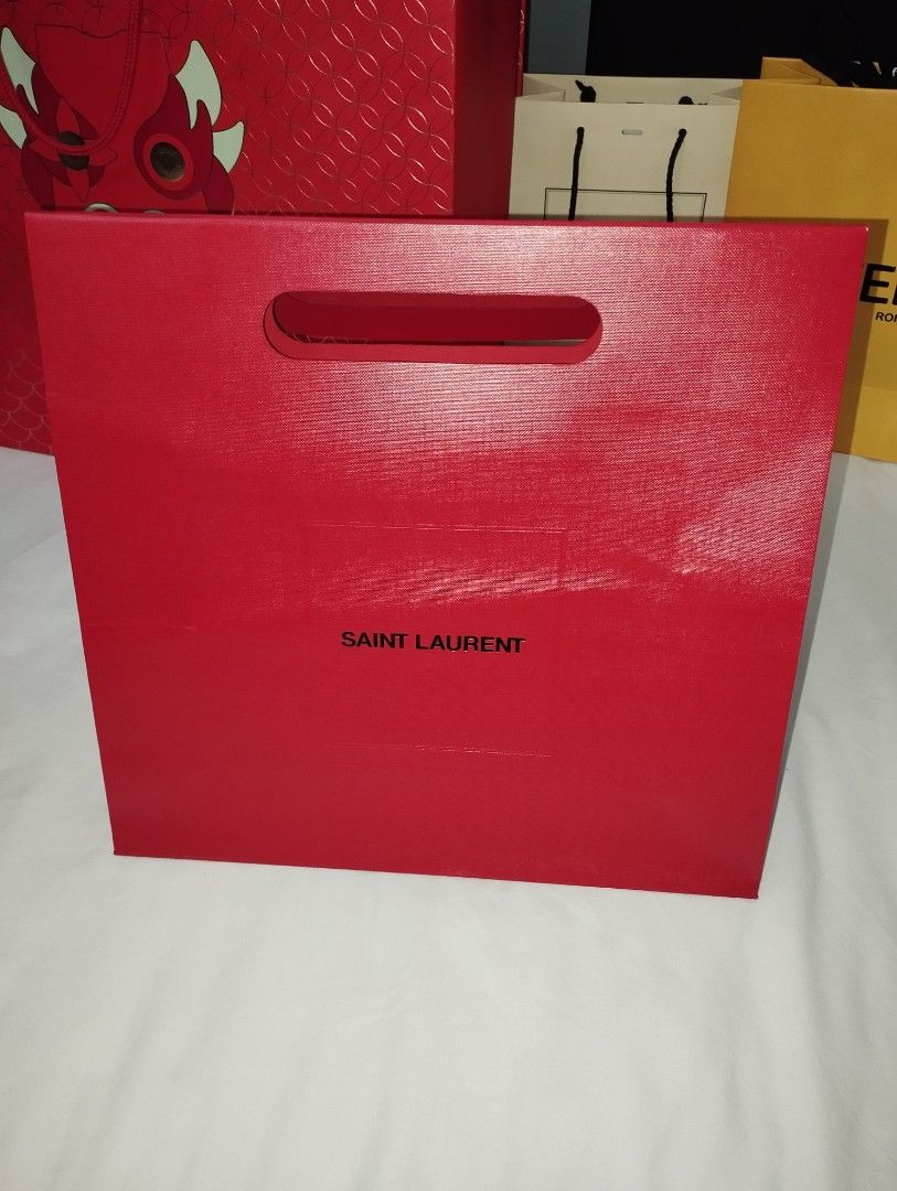 YSL red paper bag (CNY 2024), Luxury, Accessories on Carousell