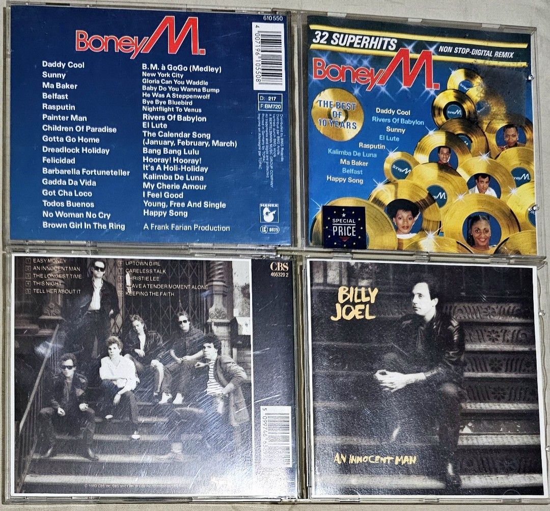 12 Music CDs featuring ABBA, Anne Murray, Billy Joel, Boney M, Carly ...