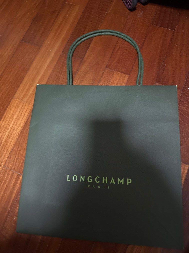 Longchamp paper bag, Luxury, Bags & Wallets on Carousell