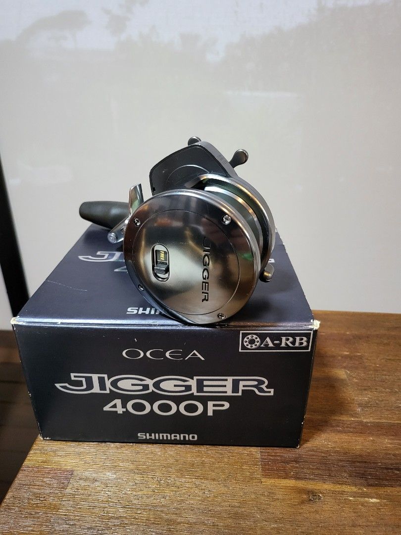 Shimano Ocea Jigger 4000P (right), Sports Equipment, Fishing on Carousell