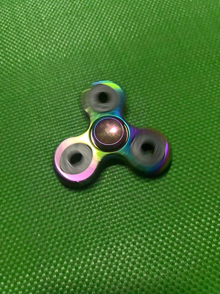 Rainbow fidget spinner, Hobbies & Toys, Toys & Games on Carousell