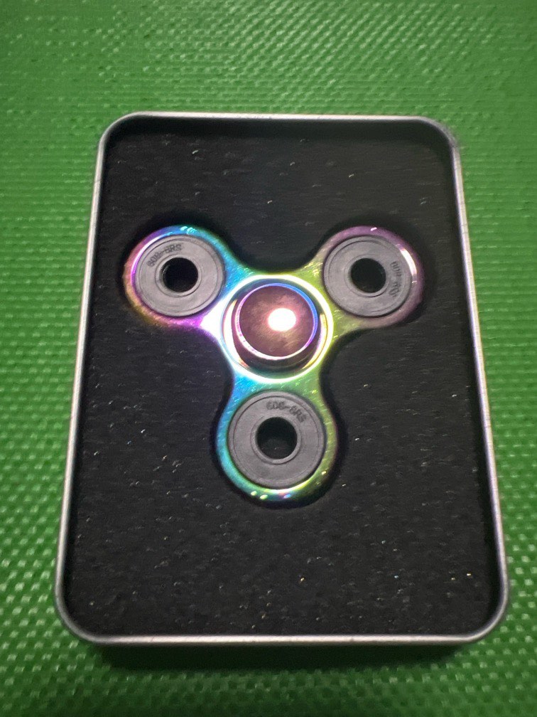 Rainbow fidget spinner, Hobbies & Toys, Toys & Games on Carousell
