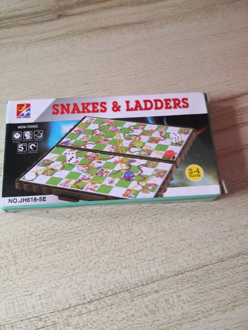 Mini snake and ladder board game on Carousell